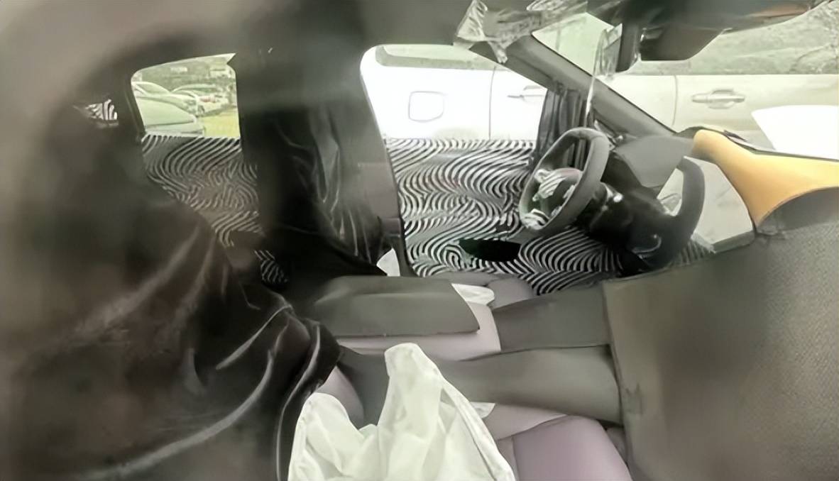 小鹏新车E29曝光：或为P7改款，取消激光雷达，方向盘神似小米SU7_搜狐汽车_搜狐网